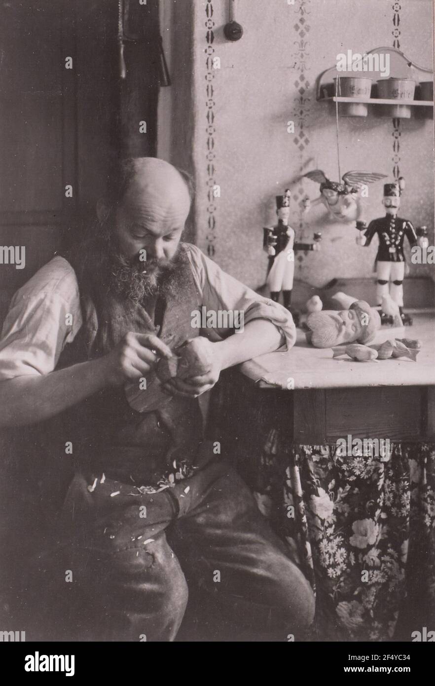 Wooden carver at work, Steinbach, 1928 Stock Photo - Alamy