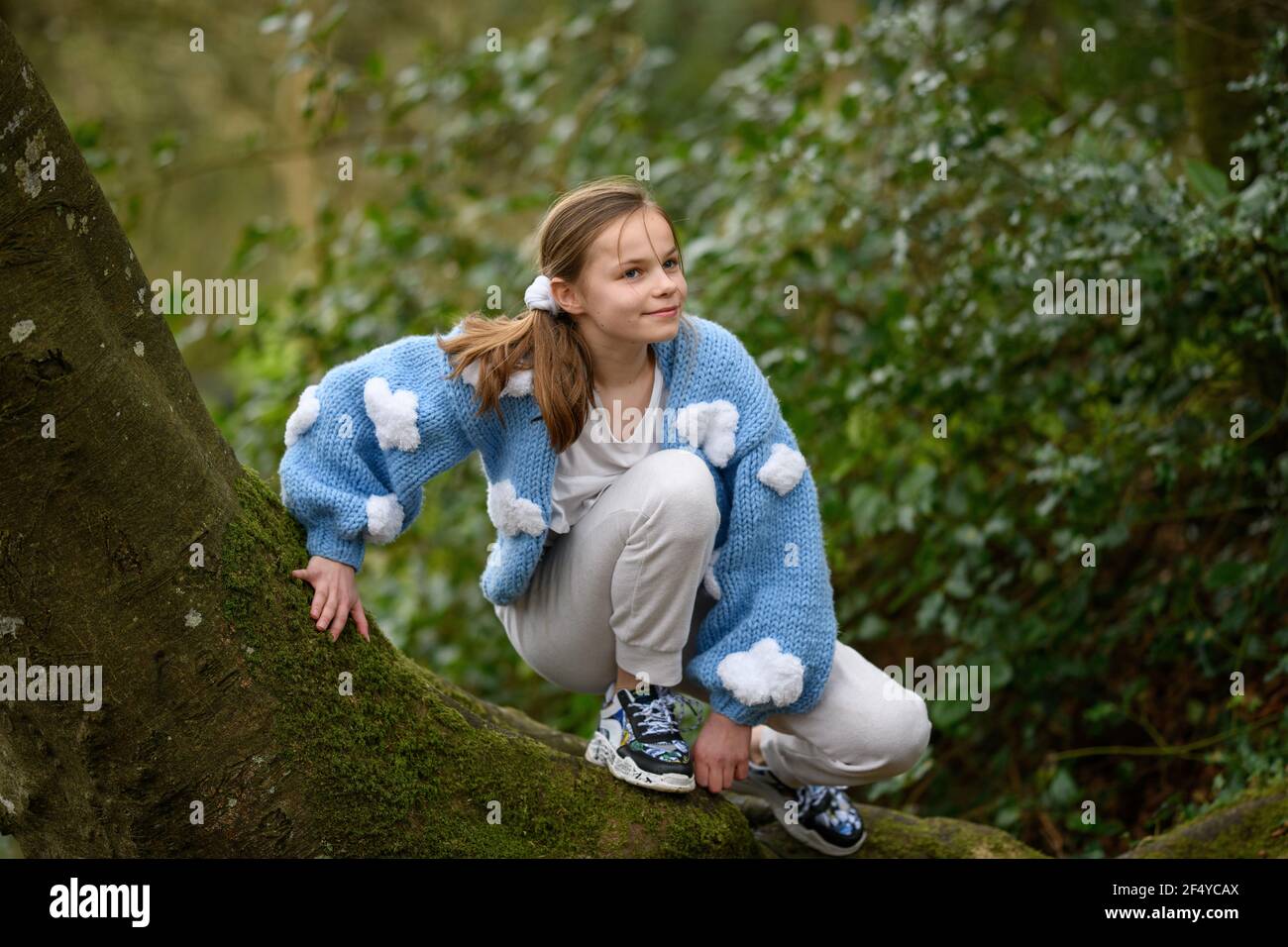 Teen crouching on hi-res stock photography and images - Alamy