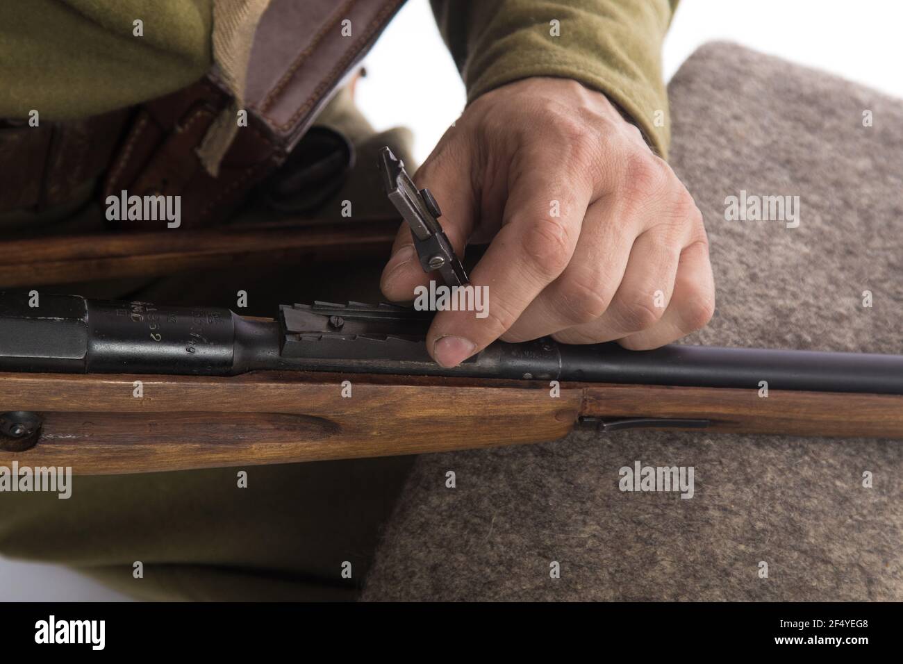Male actor in uniform and helmet ordinary soldier of Russian army ...