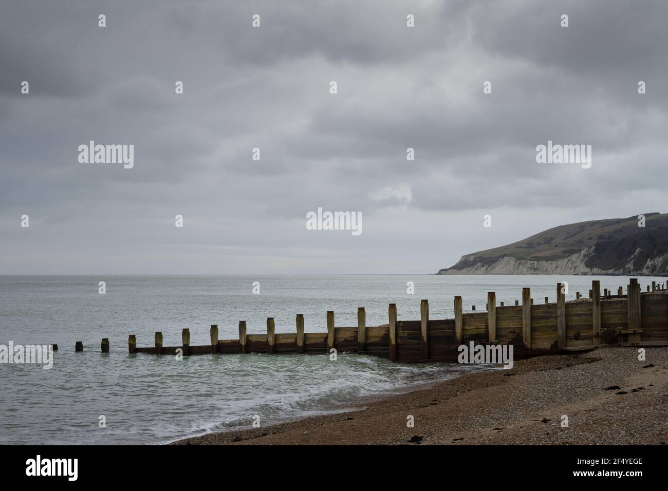 The wooden groynes on Eastbourne beach, East Sussex, England, on a ...