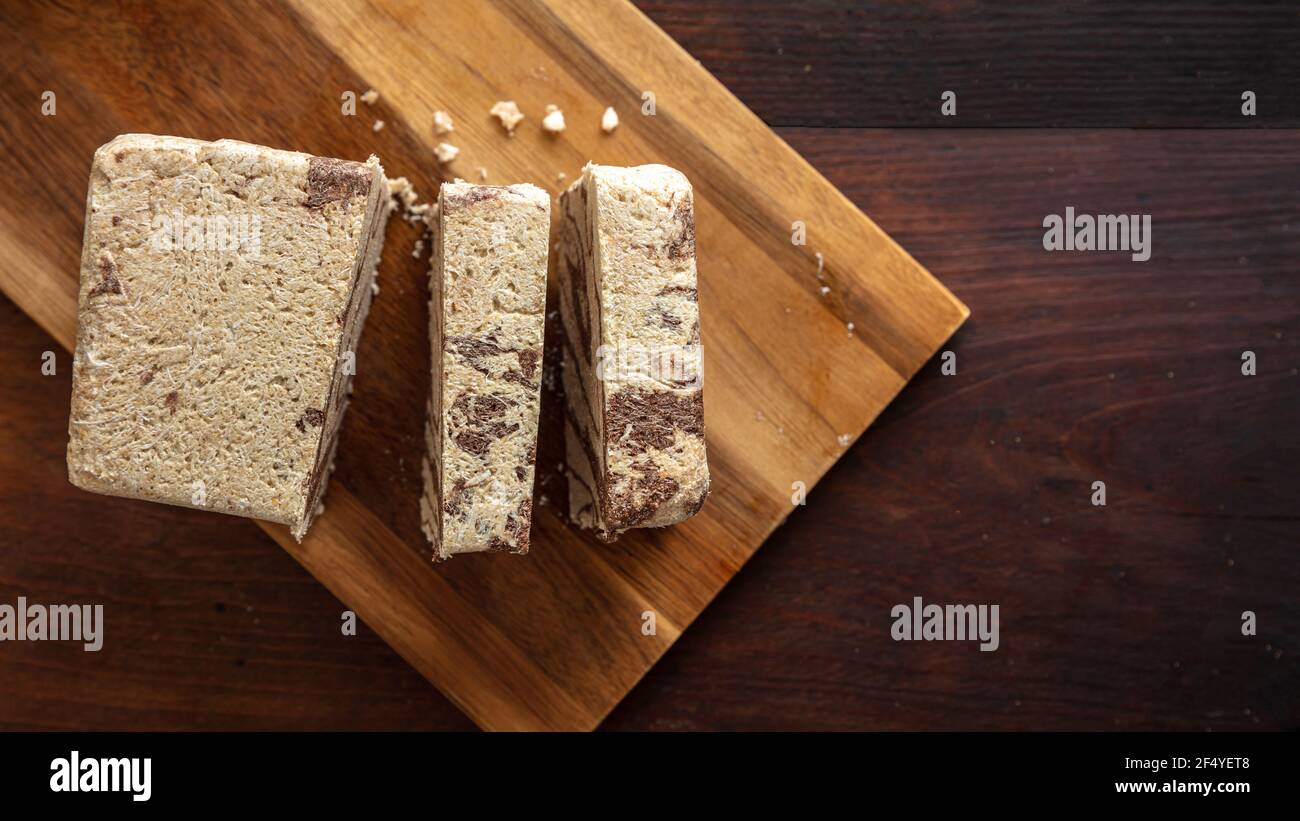 Halva cocoa and tahini. Sesame halvah also known halwa pieces with ...