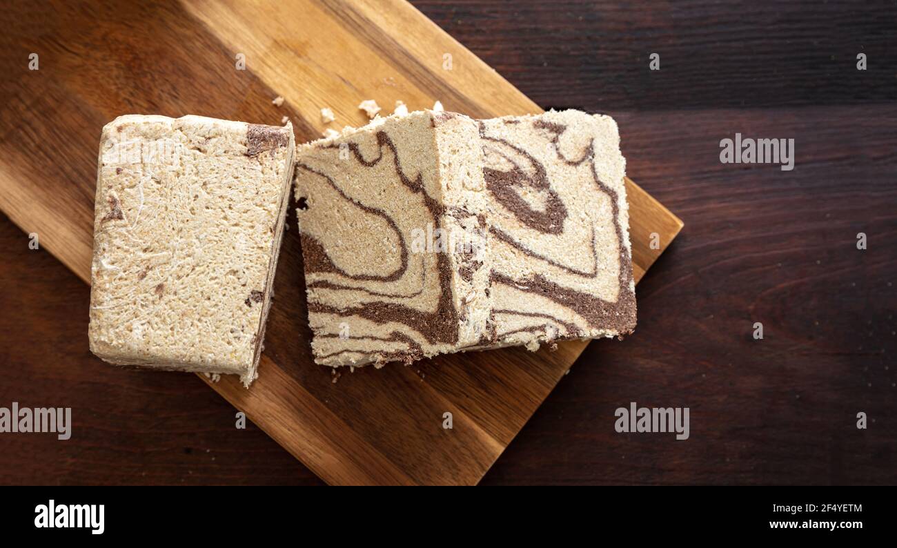 Halva cocoa and tahini. Sesame halvah also known halwa pieces with ...
