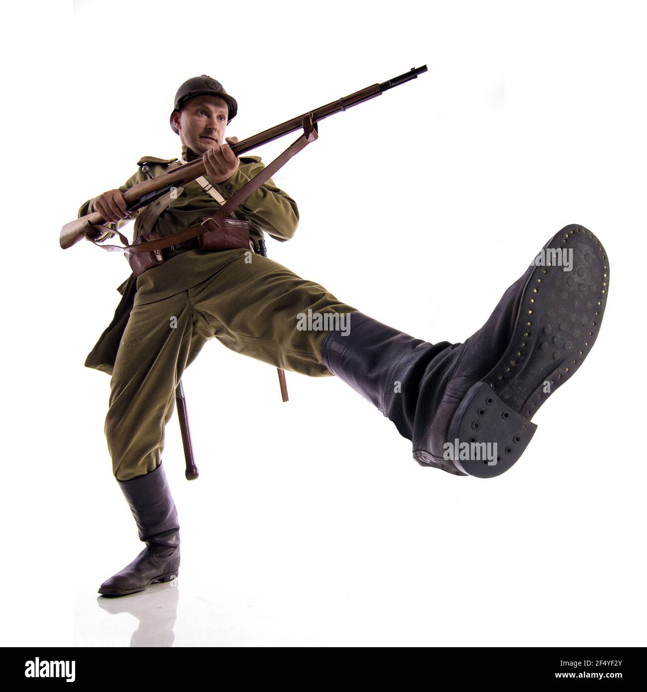 Caricatured changes Male actor in uniform and helmet ordinary soldier ...