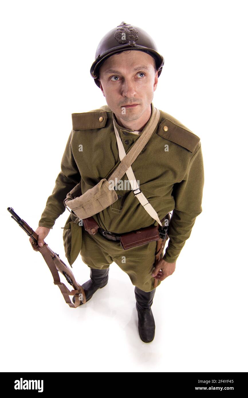 Male actor in uniform and helmet ordinary soldier of Russian army ...