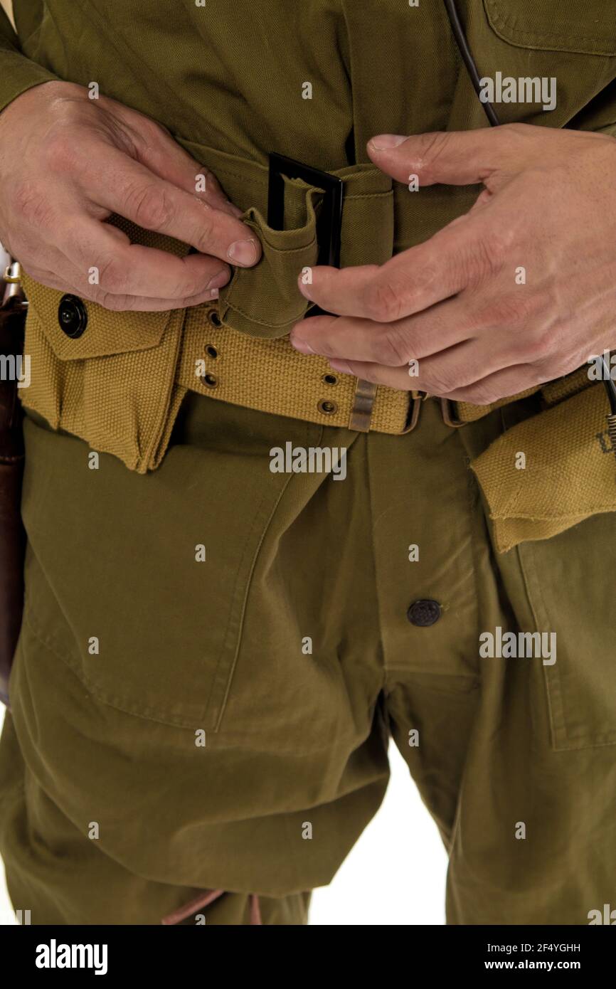 Man actor dresses or removes the military uniform of an American ...