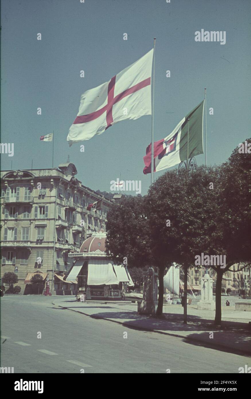 Travel Photos Italy. Genoa, street view with the flags Genuas and the ...