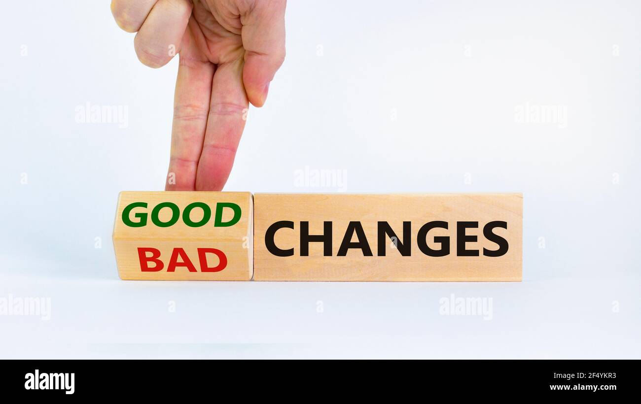 Good or bad changes symbol. Businessman turns cubes and changed words ...