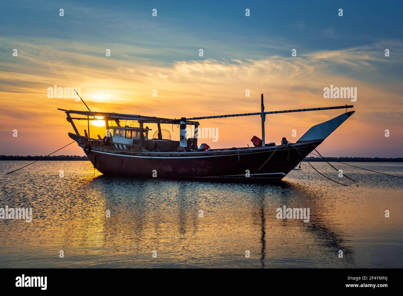 Single boat on Dammam sea side with sunrise background view. Dammam ...