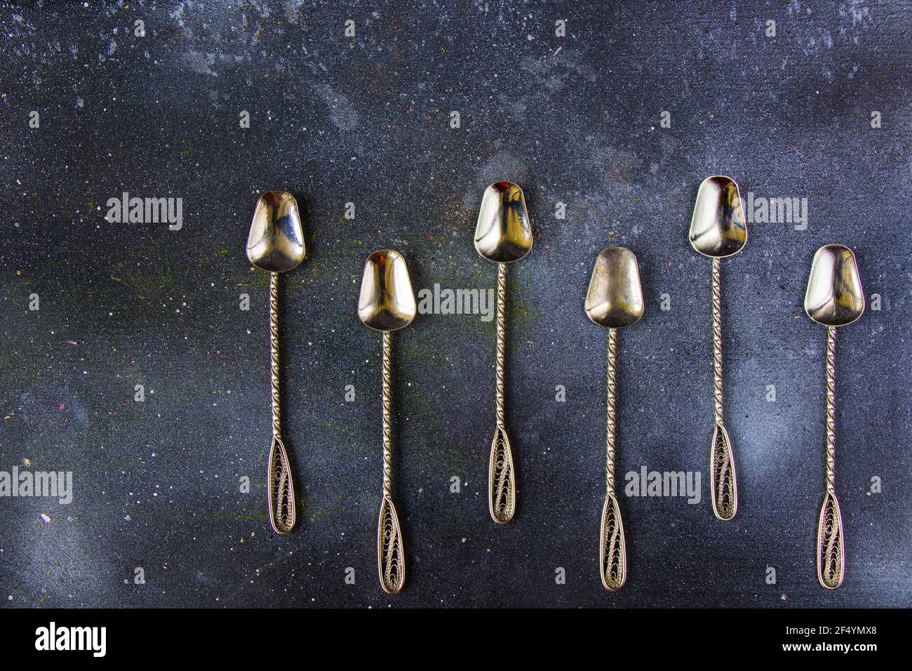 Vintage spoon set on b background Stock Photo - Alamy