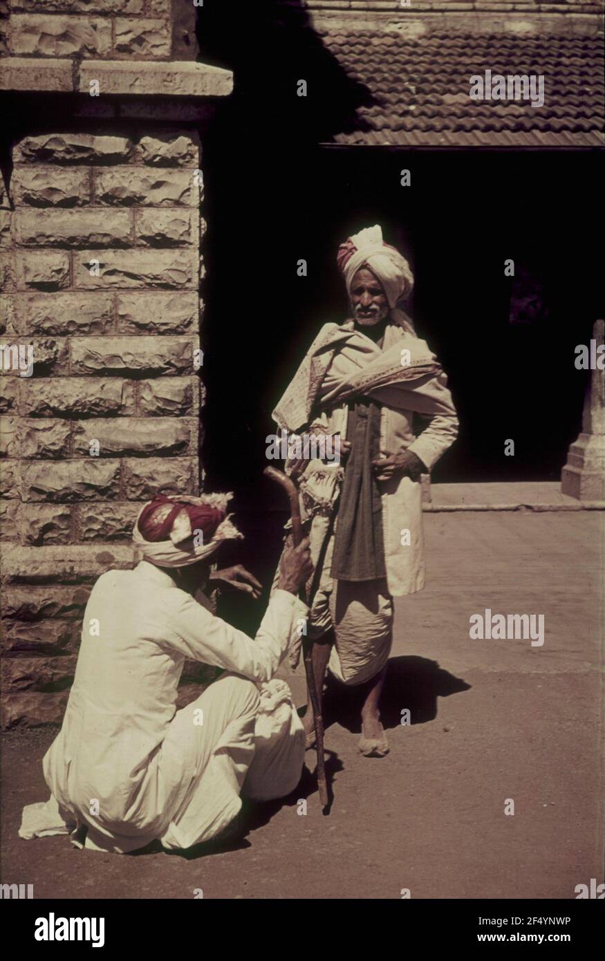 Travel Photos India. Two men talking Stock Photo - Alamy