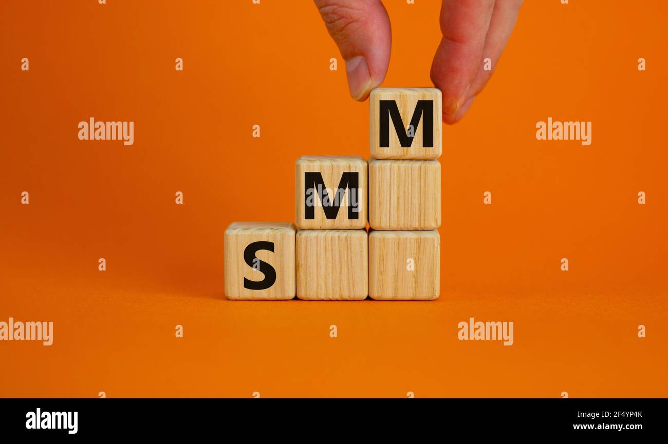 SMM, social media marketing symbol. Wooden cubes with word 'SMM ...