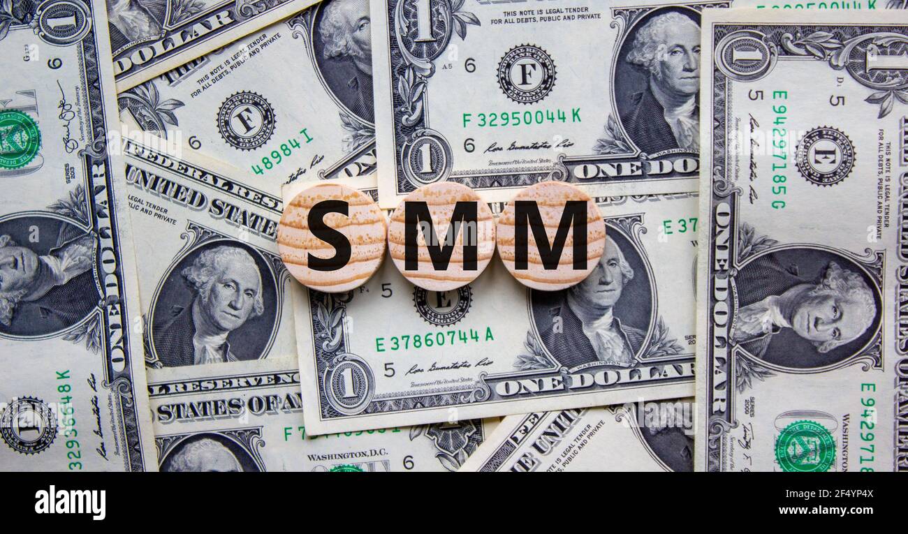 SMM, social media marketing symbol. Wooden circles with word 'SMM ...