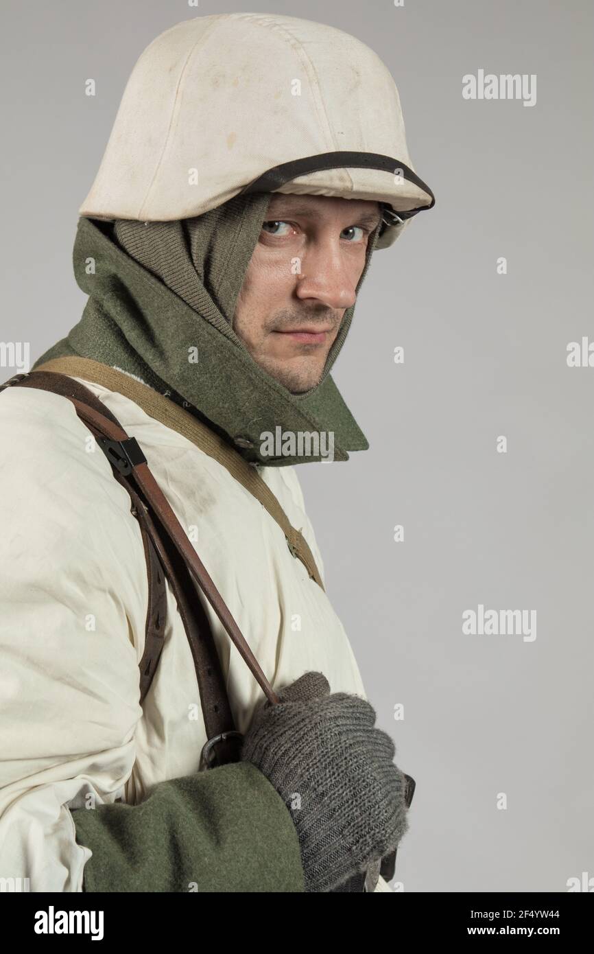 male actor in the winter military uniform of an German soldier, the ...