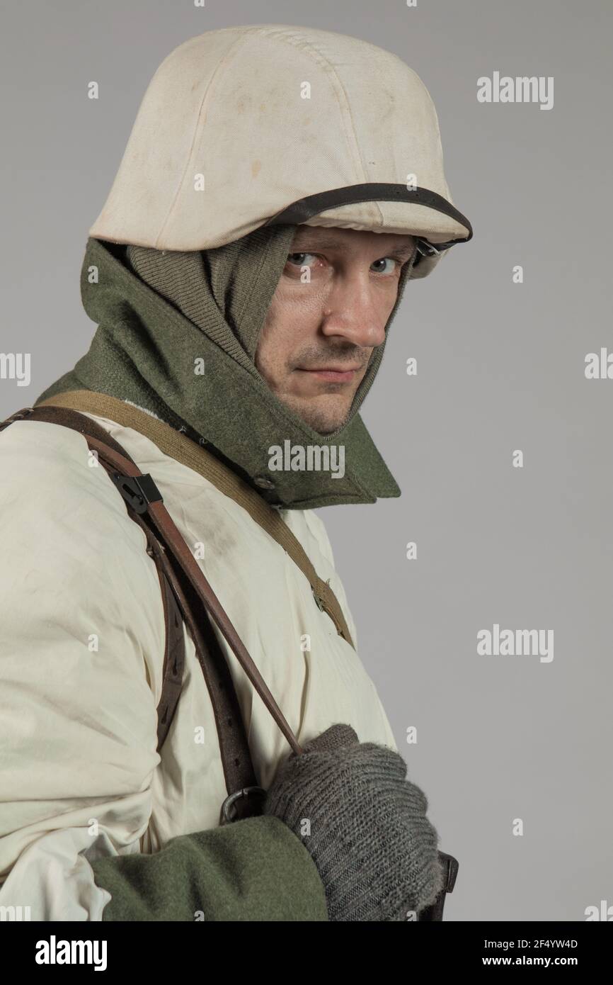 male actor in the winter military uniform of an German soldier, the ...