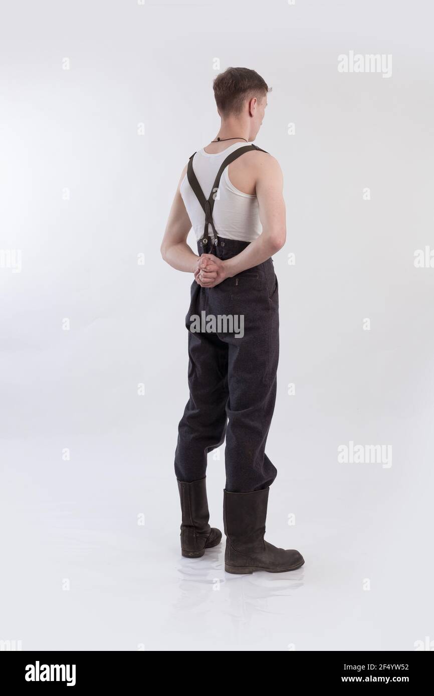 Man actor in the movie role of an old military man posing against white ...
