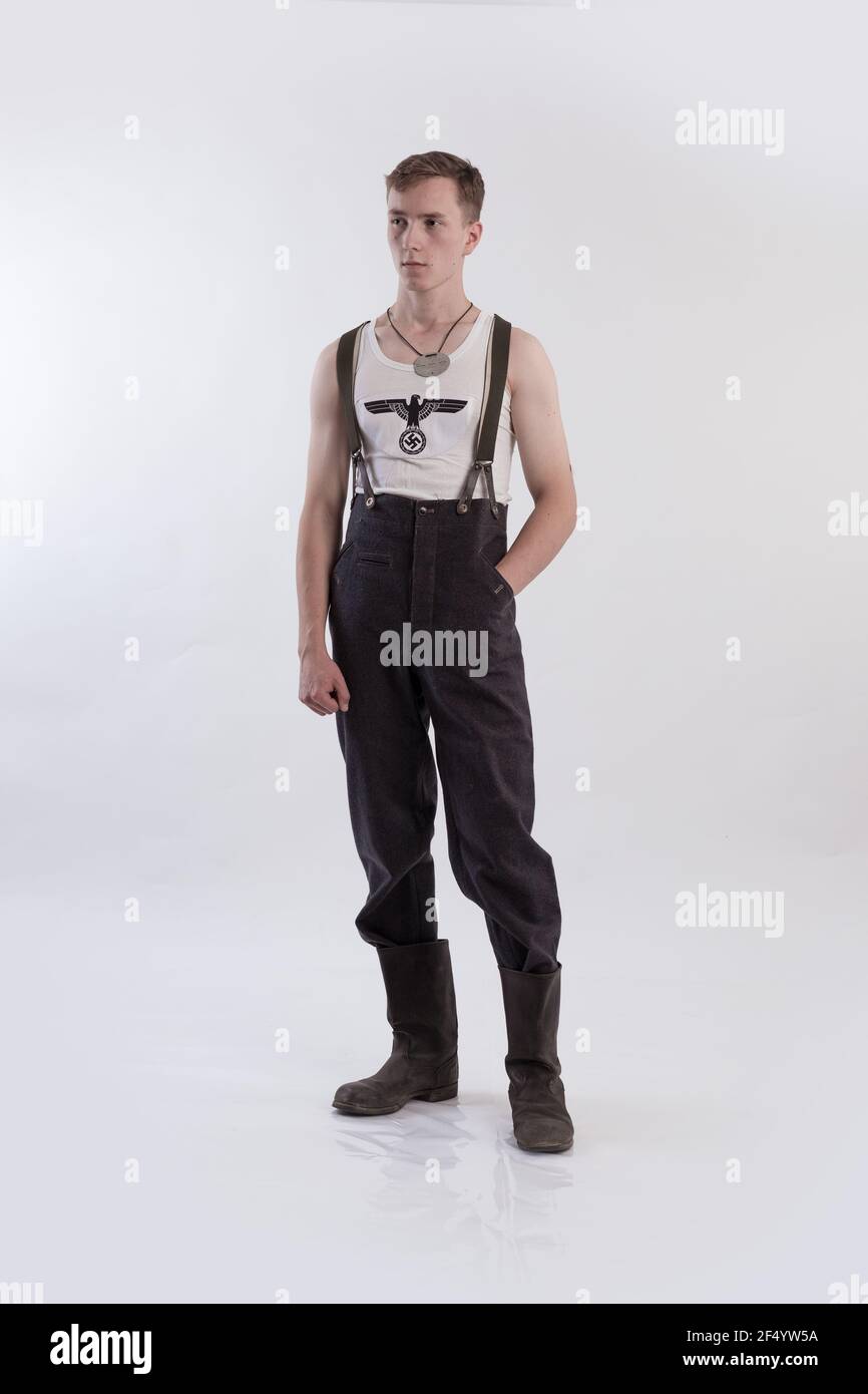 Man actor in the movie role of an old military man posing against white ...