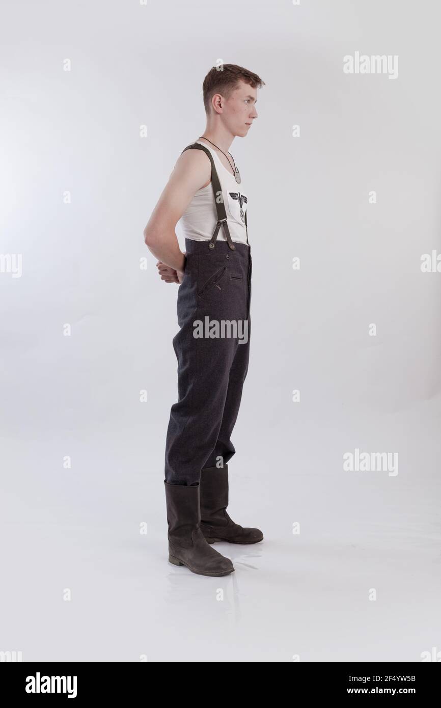 Man actor in the movie role of an old military man posing against white ...