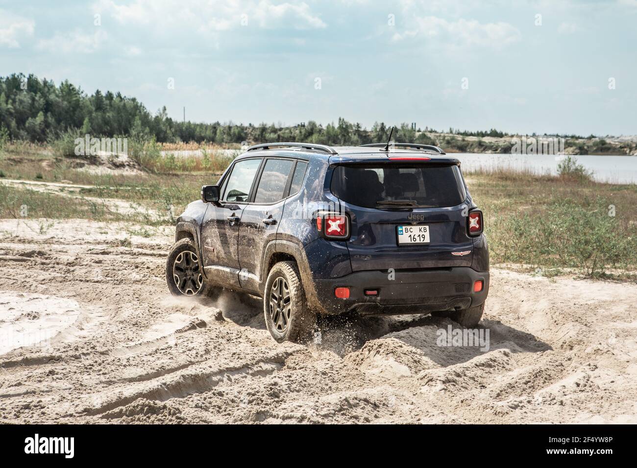 man drifting doing donuts at sand beach. having fun Stock Photo - Alamy