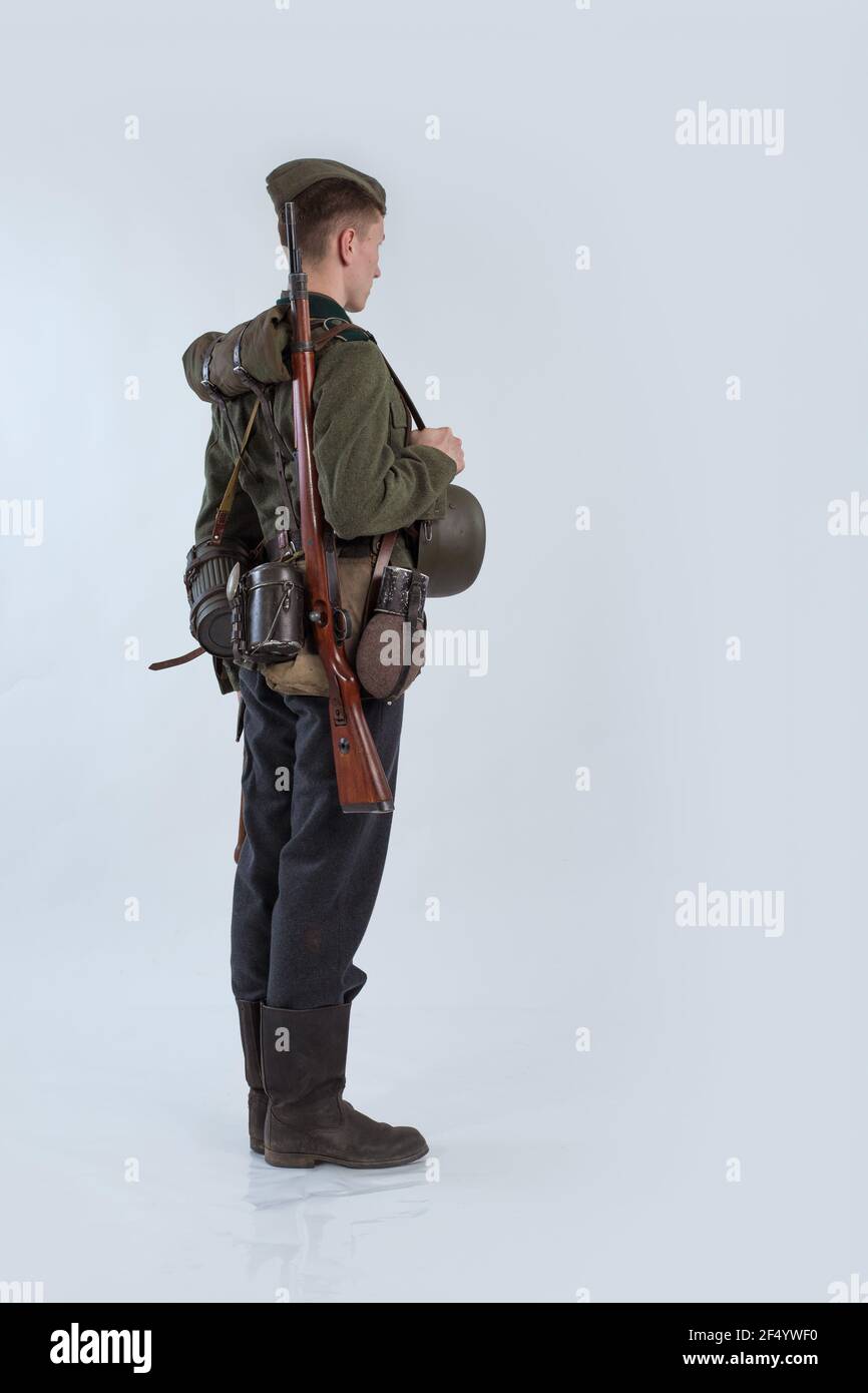 Man actor in the movie role of an old military man posing against white ...