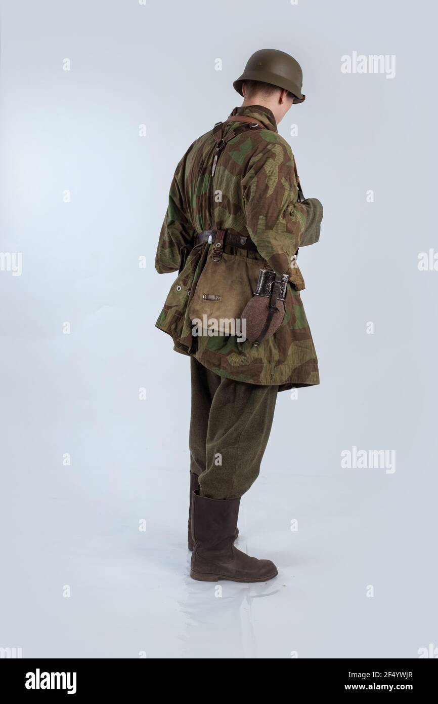 Man actor in the movie role of an old military man posing against white ...