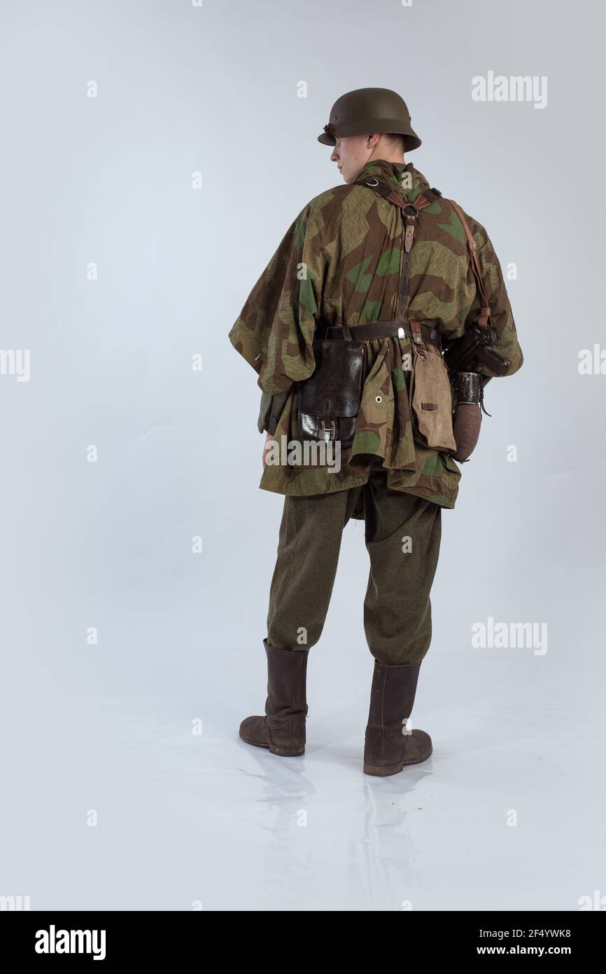 Man actor in the movie role of an old military man posing against white ...