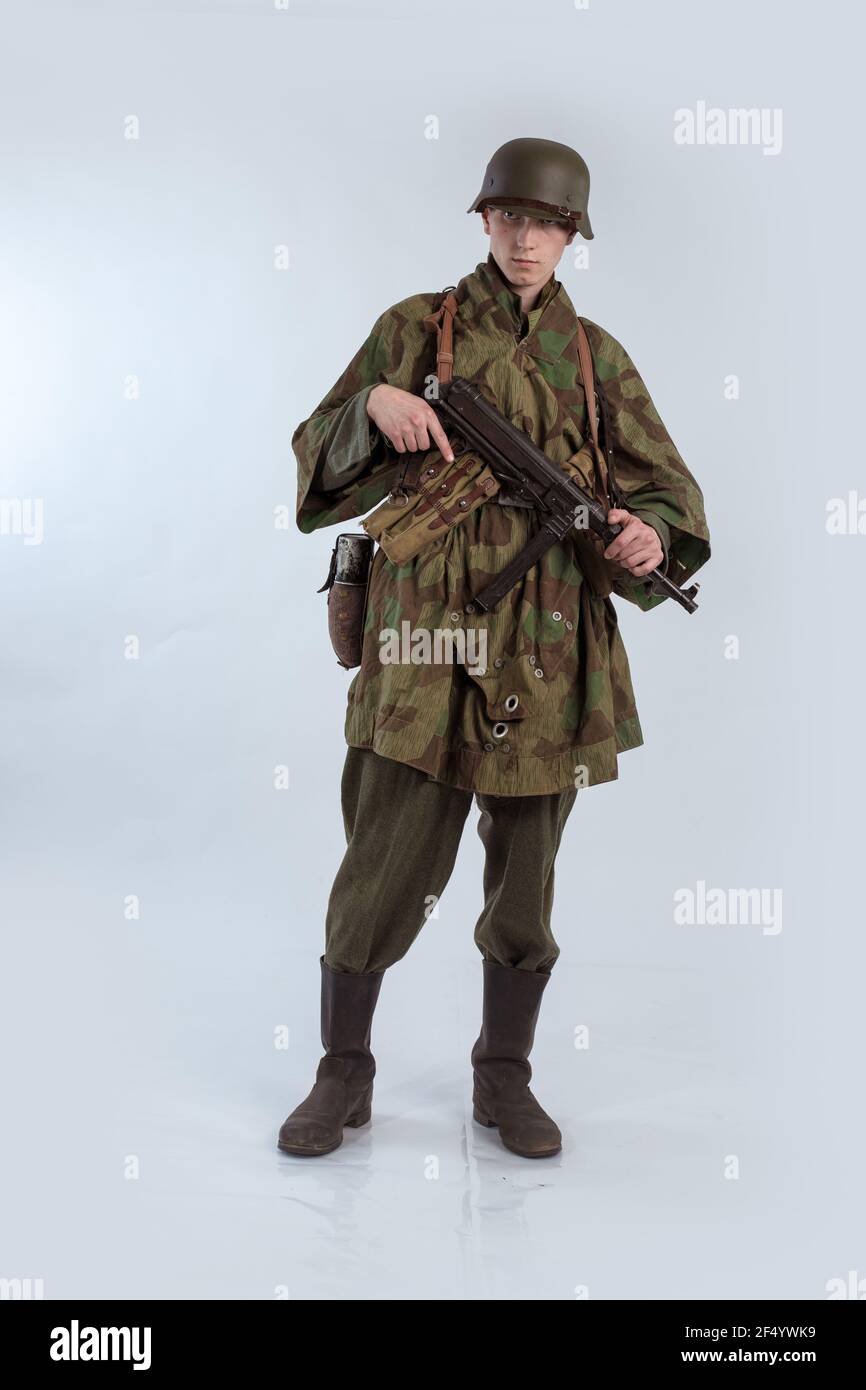 Man actor in the movie role of an old military man posing against white ...