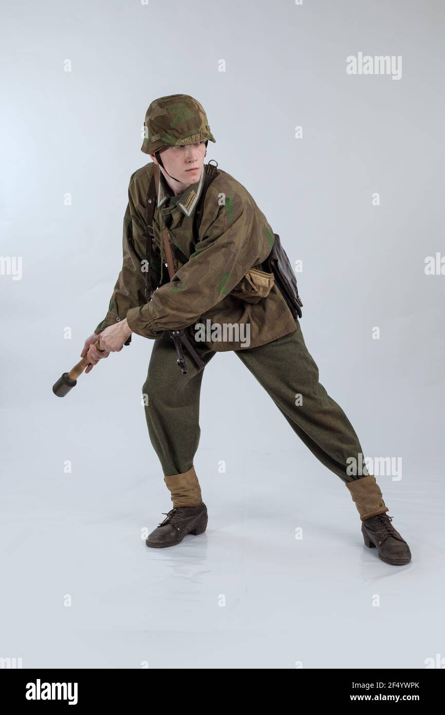 Man actor in the movie role of an old military man posing against white ...