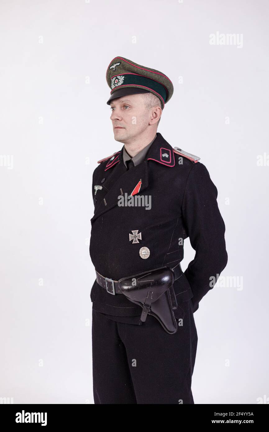 Male actor reenactor in historical military tank uniform as an officer ...
