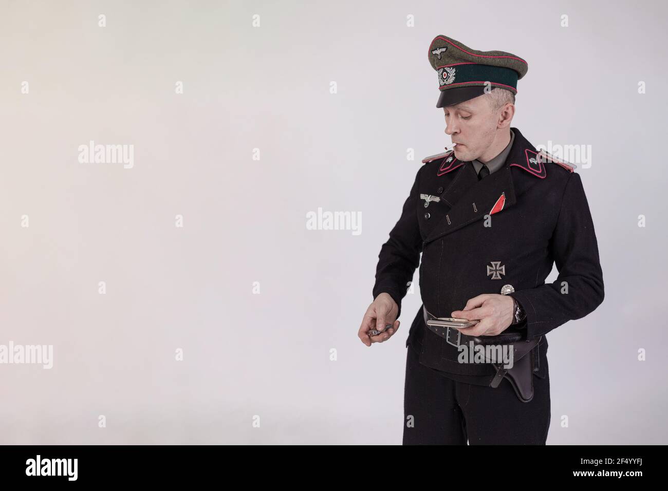 Male actor reenactor in historical military tank uniform as an officer ...