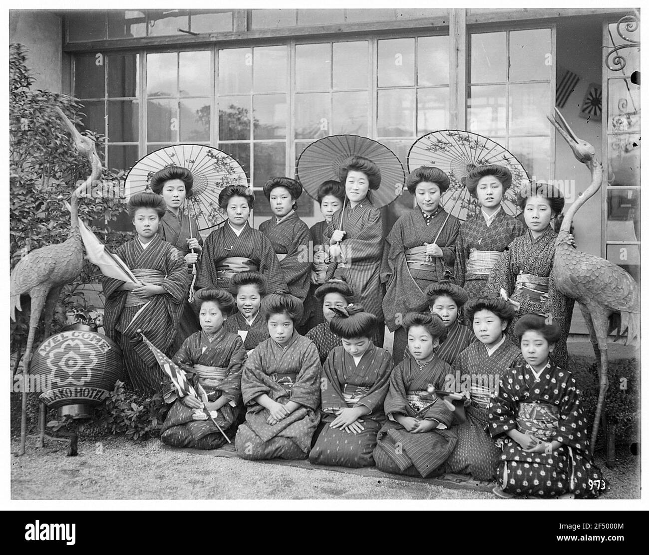 Kyoto. Group picture with service staff in traditional clothing in ...