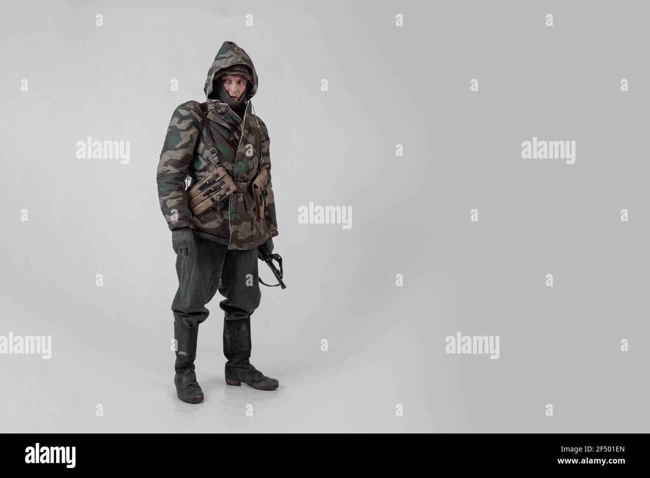 Man actor in the movie role of an old military man posing against white ...