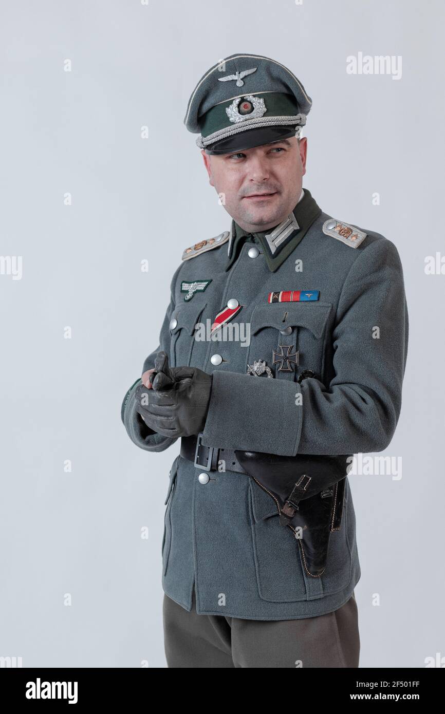 Man actor in the movie role of an old military man posing against white ...