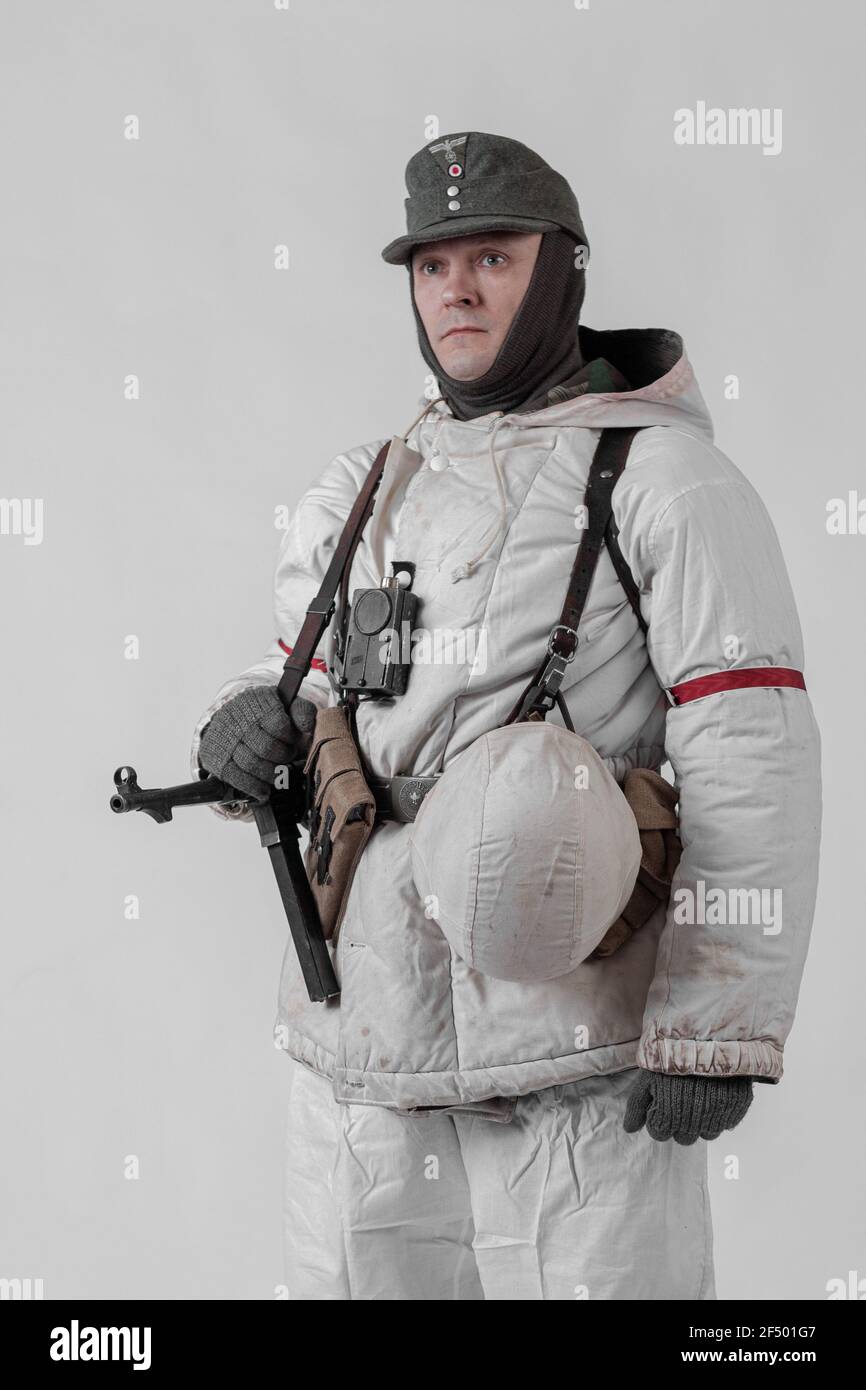 male actor in the winter military uniform of an German soldier, the ...