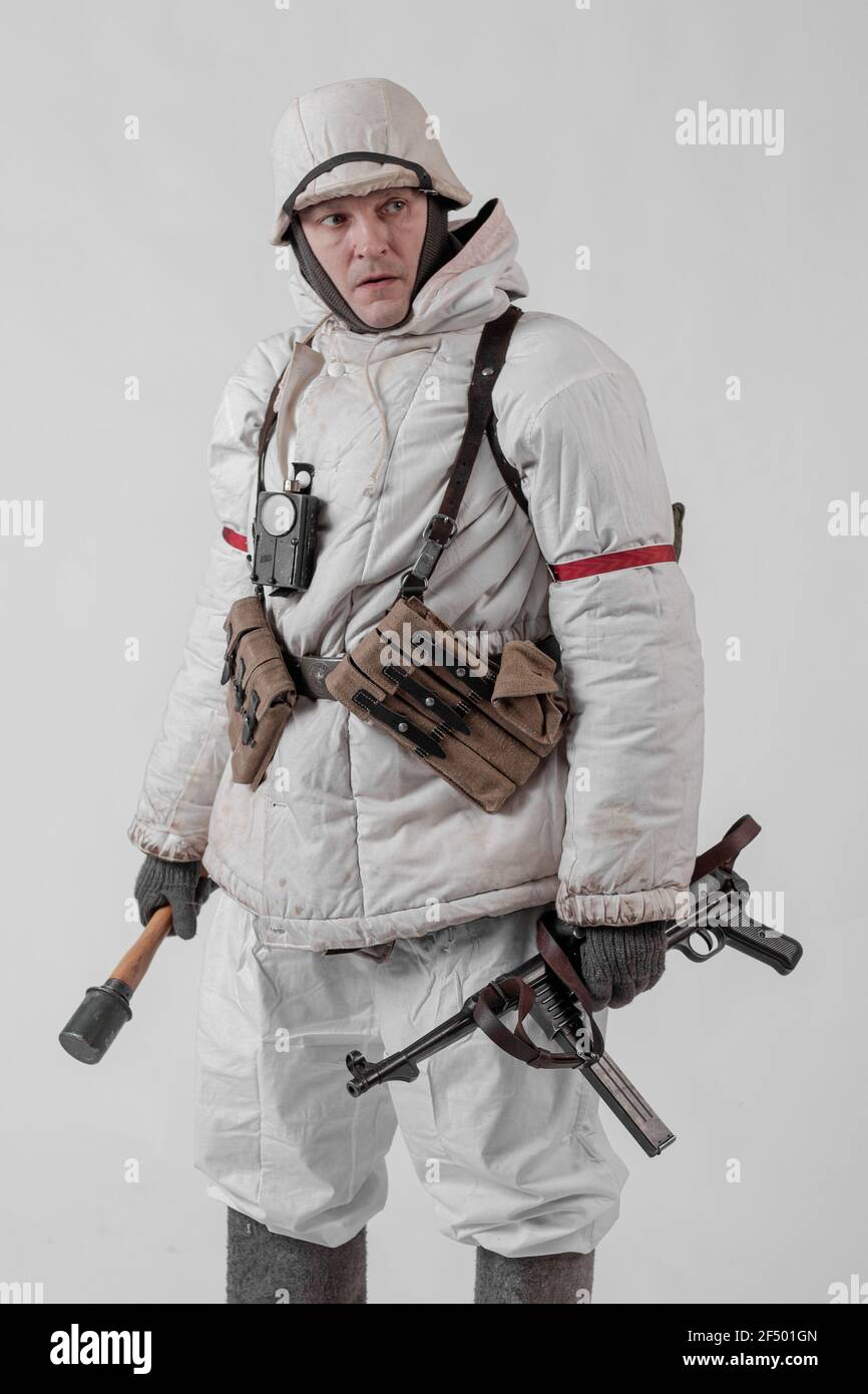 male actor in the winter military uniform of an German soldier, the ...