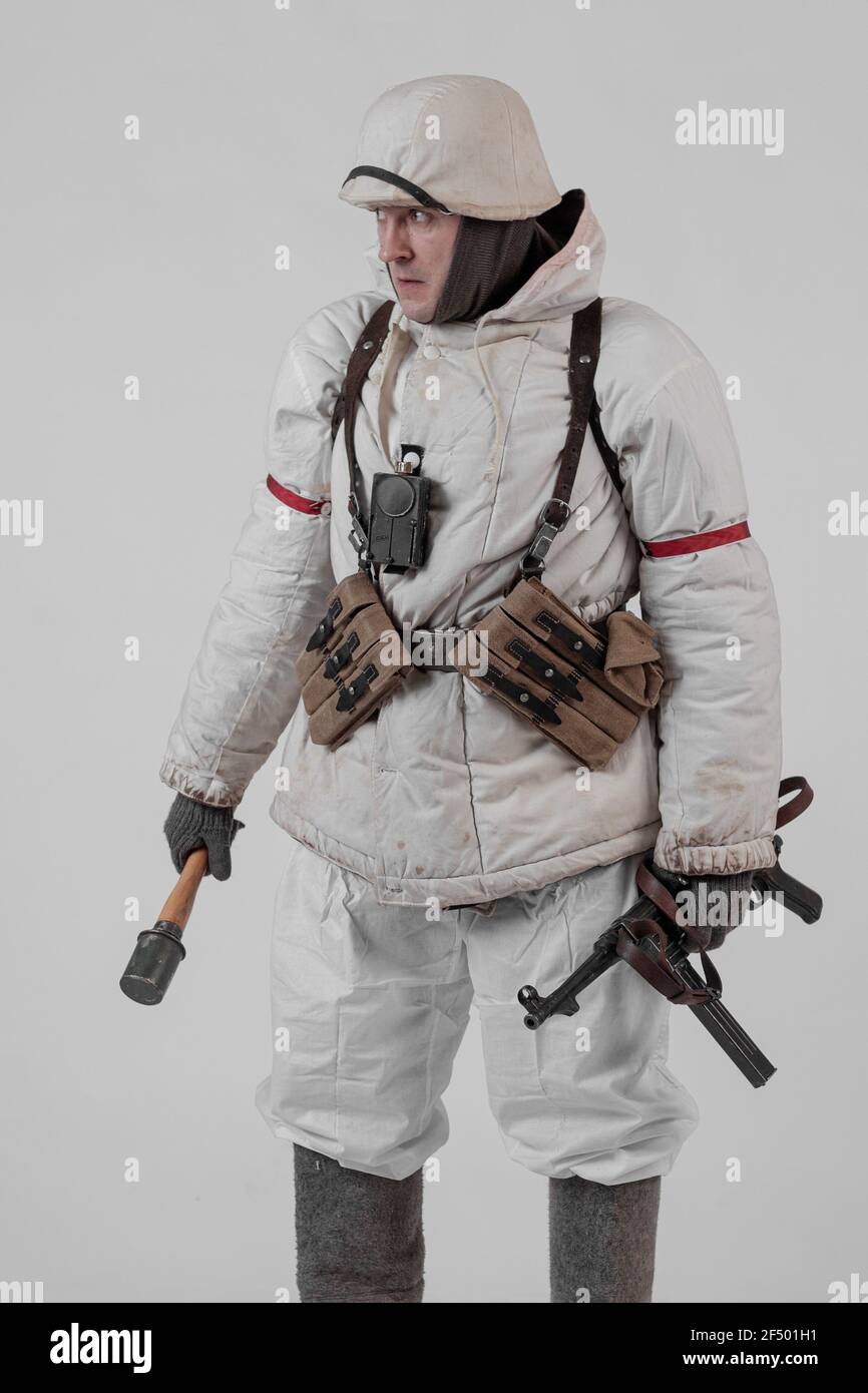 male actor in the winter military uniform of an German soldier, the ...