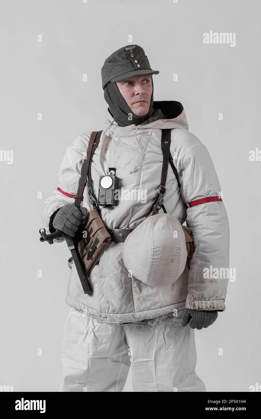 male actor in the winter military uniform of an German soldier, the ...