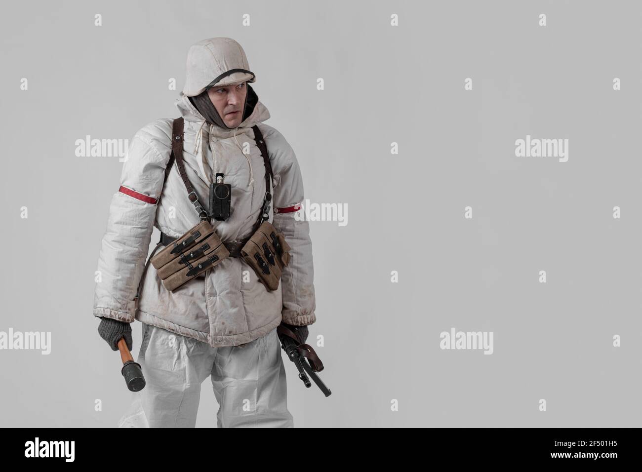 male actor in the winter military uniform of an German soldier, the ...
