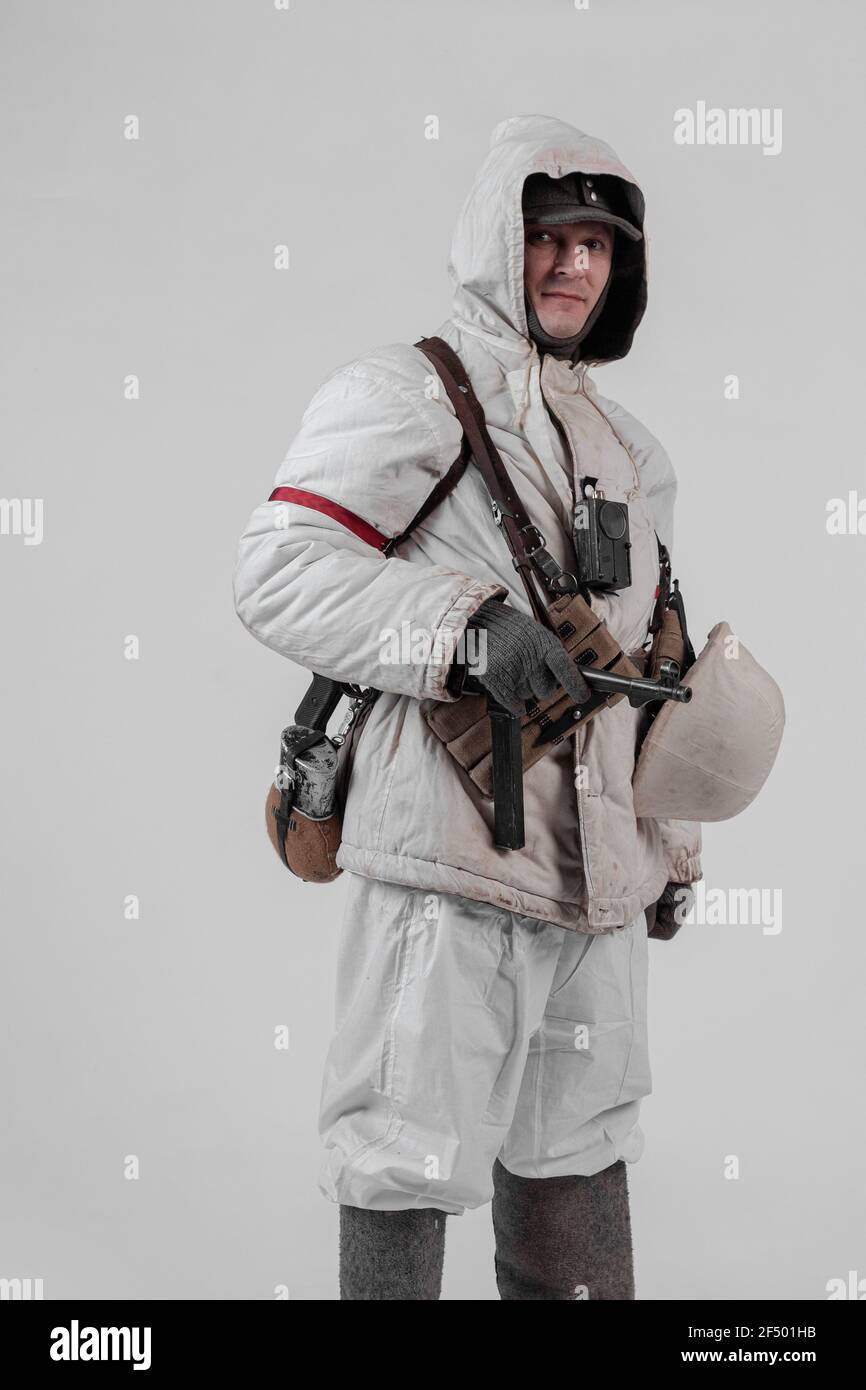 male actor in the winter military uniform of an German soldier, the ...