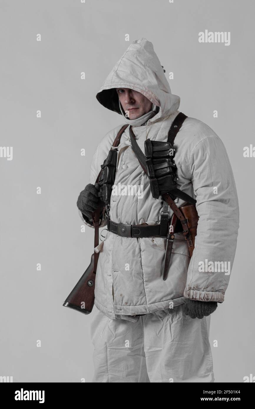 male actor in the winter military uniform of an German soldier, the ...