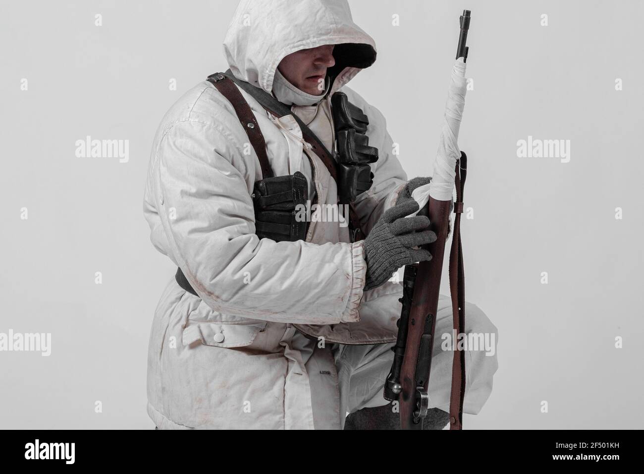 male actor in the winter military uniform of an German soldier, the ...
