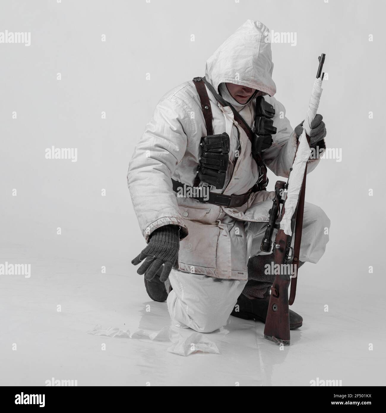 male actor in the winter military uniform of an German soldier, the ...