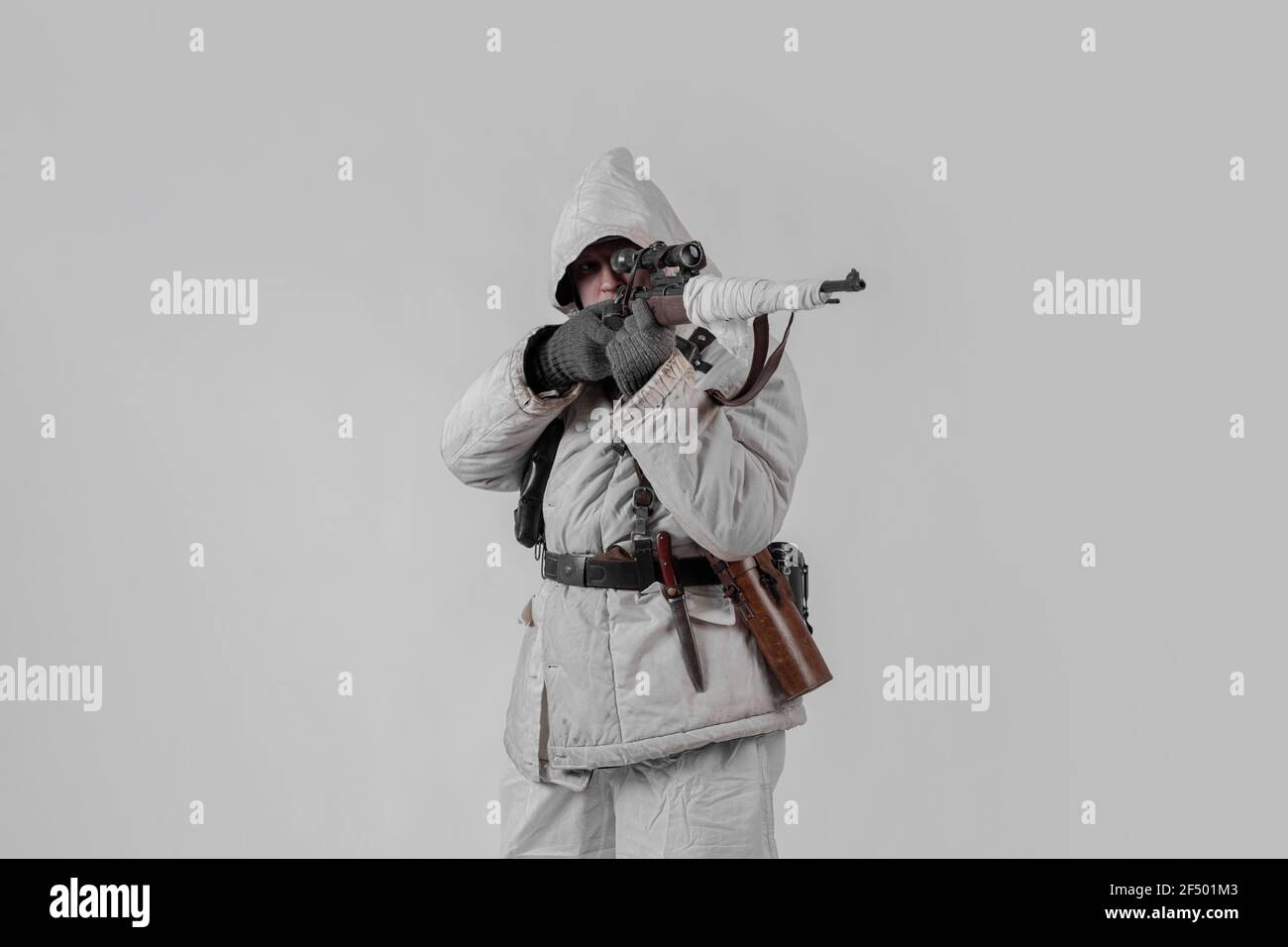 male actor in the winter military uniform of an German soldier, the ...