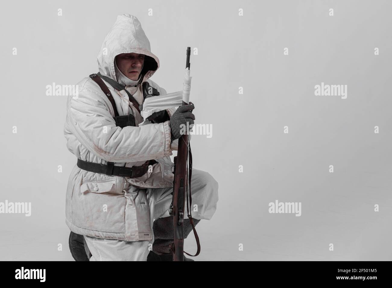 male actor in the winter military uniform of an German soldier, the ...