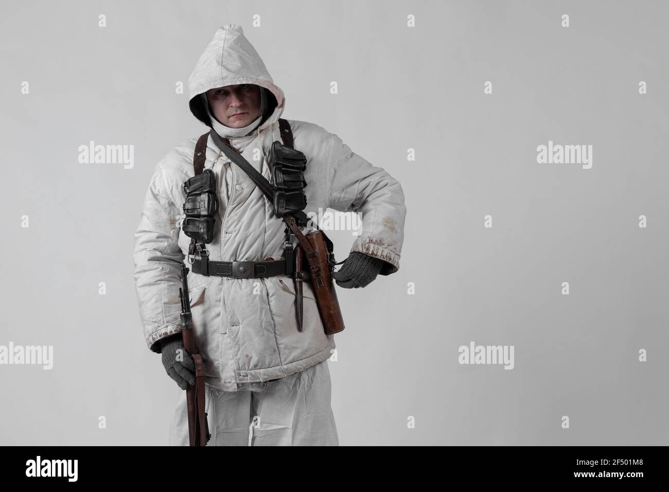 male actor in the winter military uniform of an German soldier, the ...