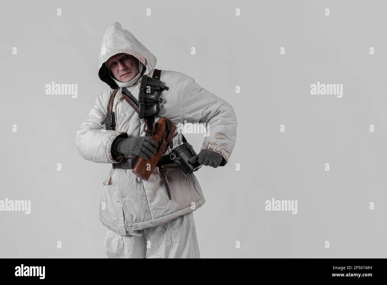 male actor in the winter military uniform of an German soldier, the ...