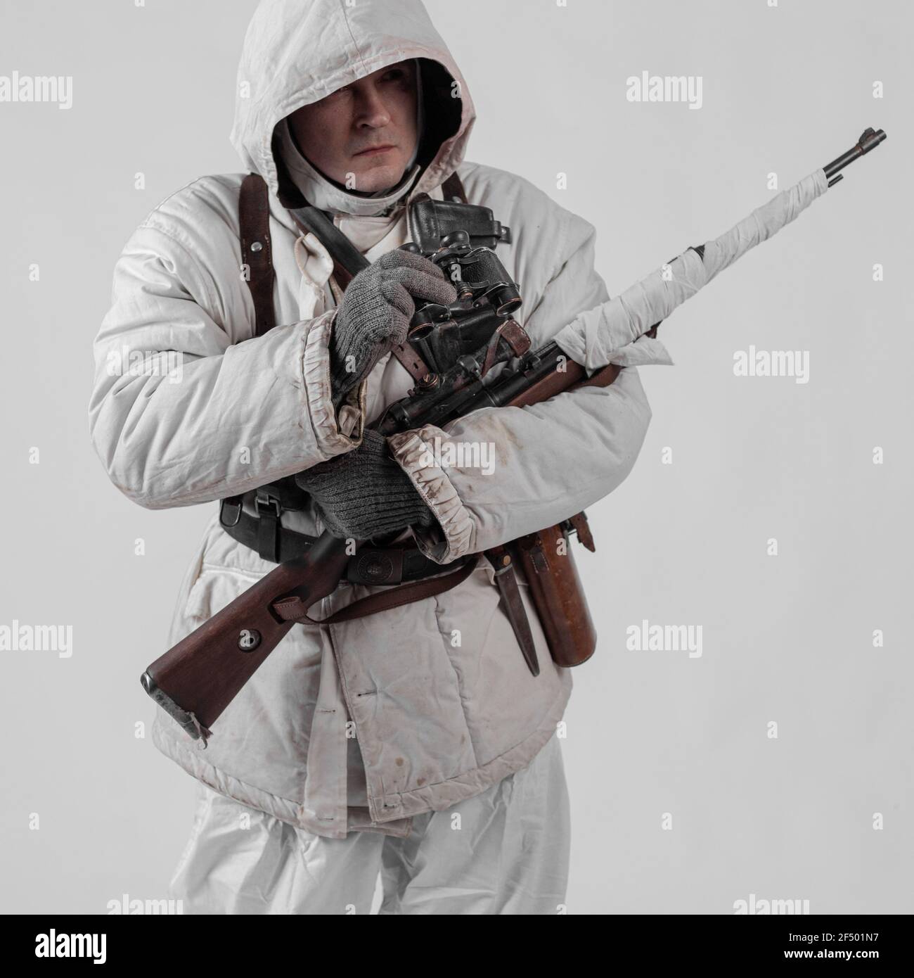 male actor in the winter military uniform of an German soldier, the ...