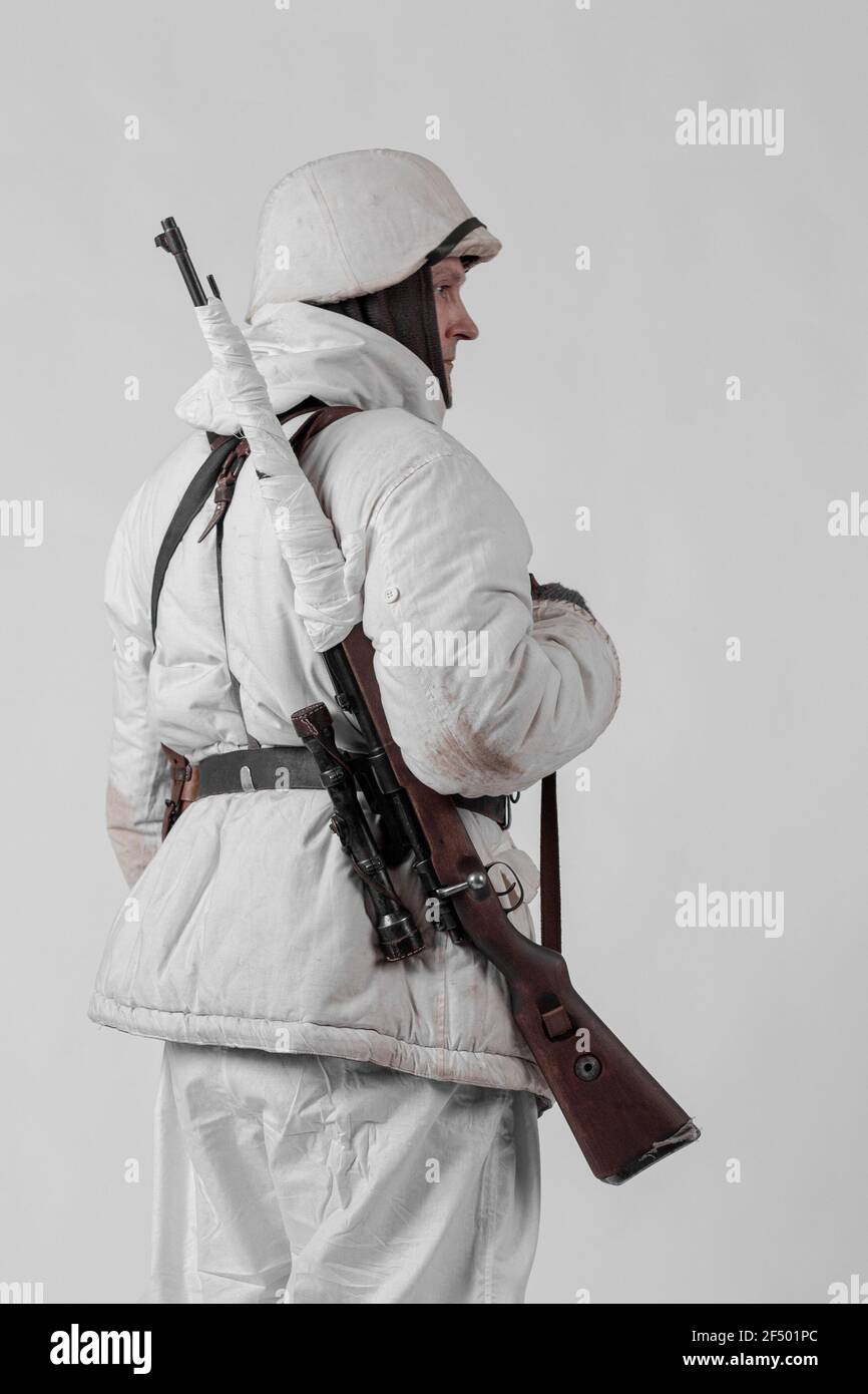 male actor in the winter military uniform of an German soldier, the ...