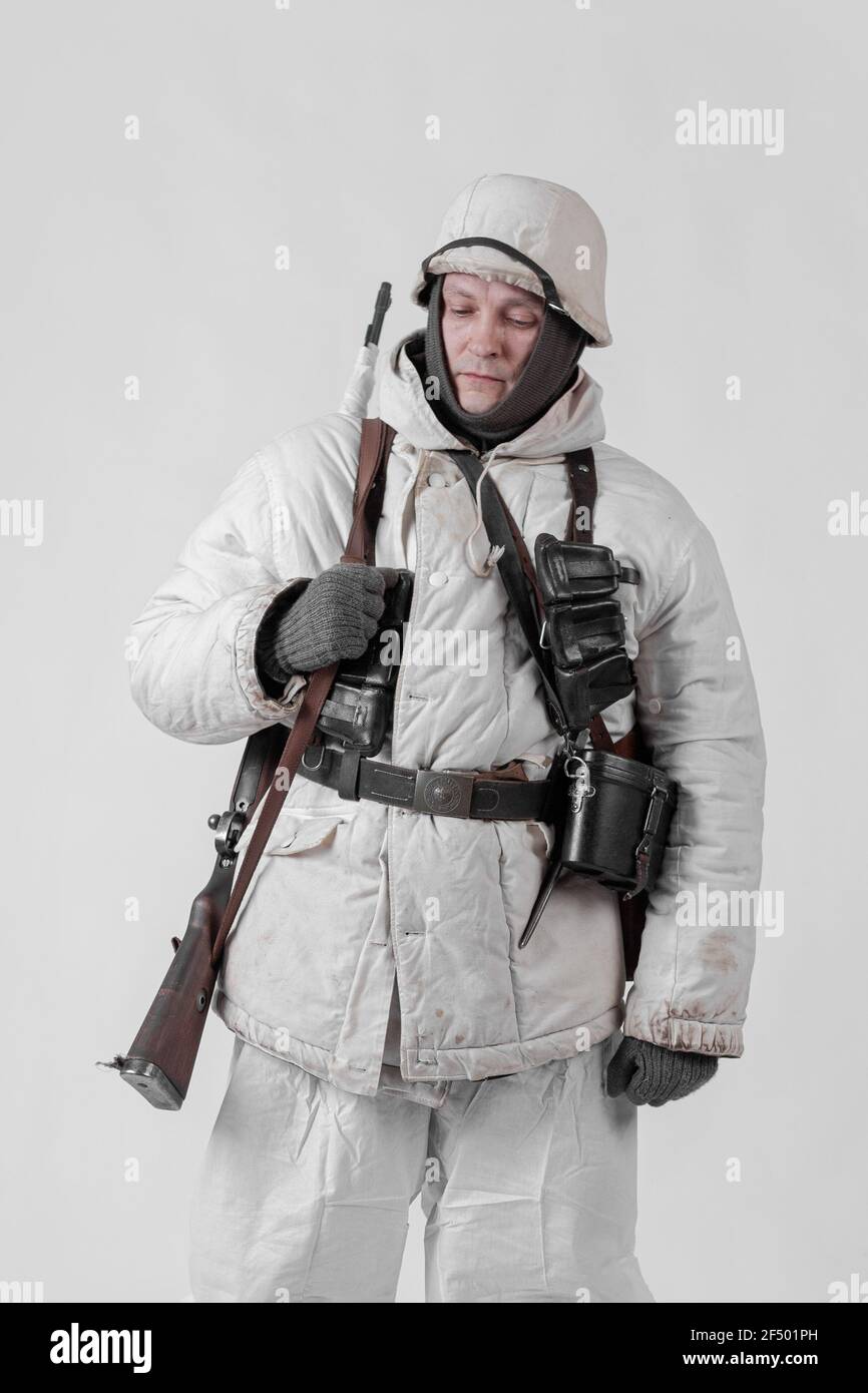 male actor in the winter military uniform of an German soldier, the ...