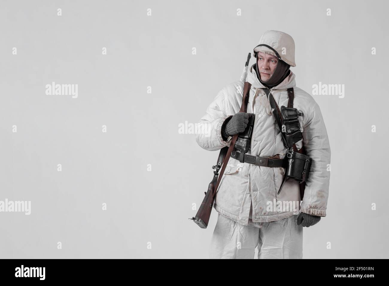 male actor in the winter military uniform of an German soldier, the ...
