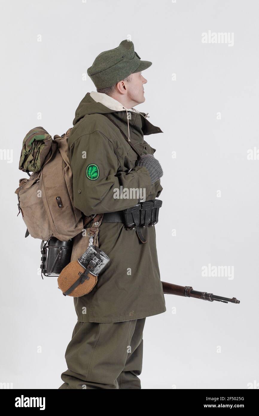 male actor in the winter military uniform of an German soldier, the ...